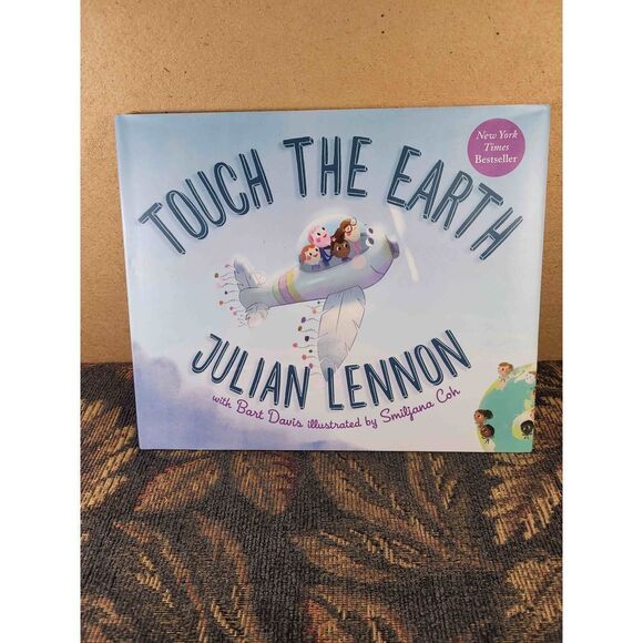 None | Accents | Touchthe Earth Julian Lennon White Feather Flier ...